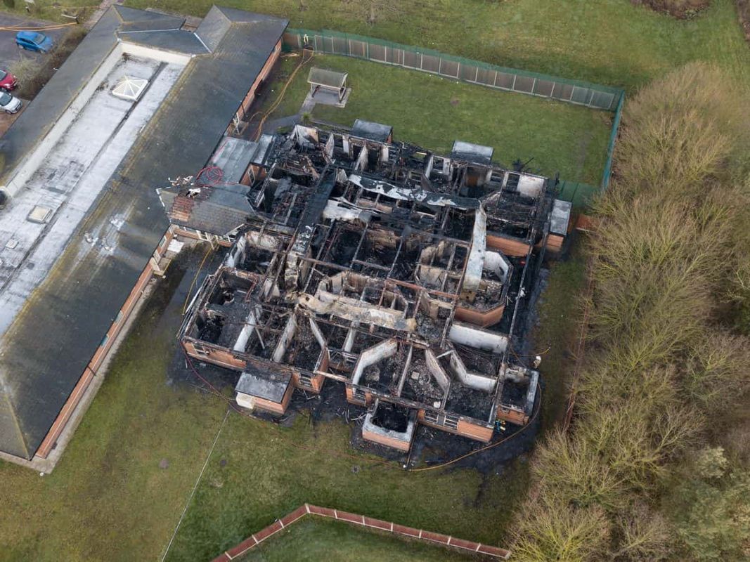 Huge fire engulfs mental hospital after a patient is seen fleeing the scene