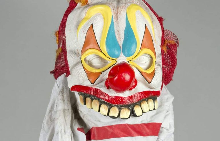 Clown mask drill rapper who pointed gun at police and his pals each ...