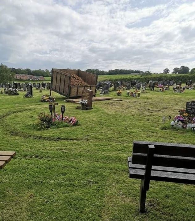 Grieving family outraged after workmen dump skip on father's grave