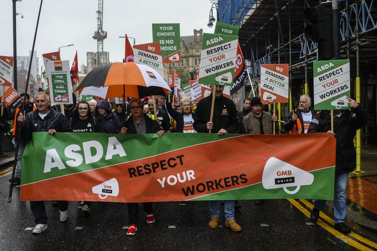Hundreds of workers march on ASDA's head office in protest over ...