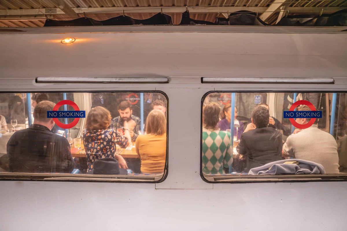 Dine in a tube carriage at London's most unique supperclub