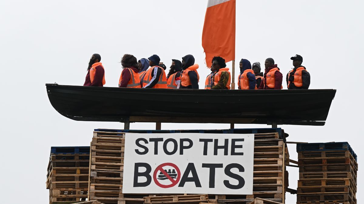 Police investigating 'migrant boat' bonfire as hate incident