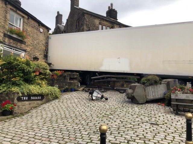 Photos Show Lorry Which Got Stuck After Crashing Into A Cottage In A Picturesque Village Made