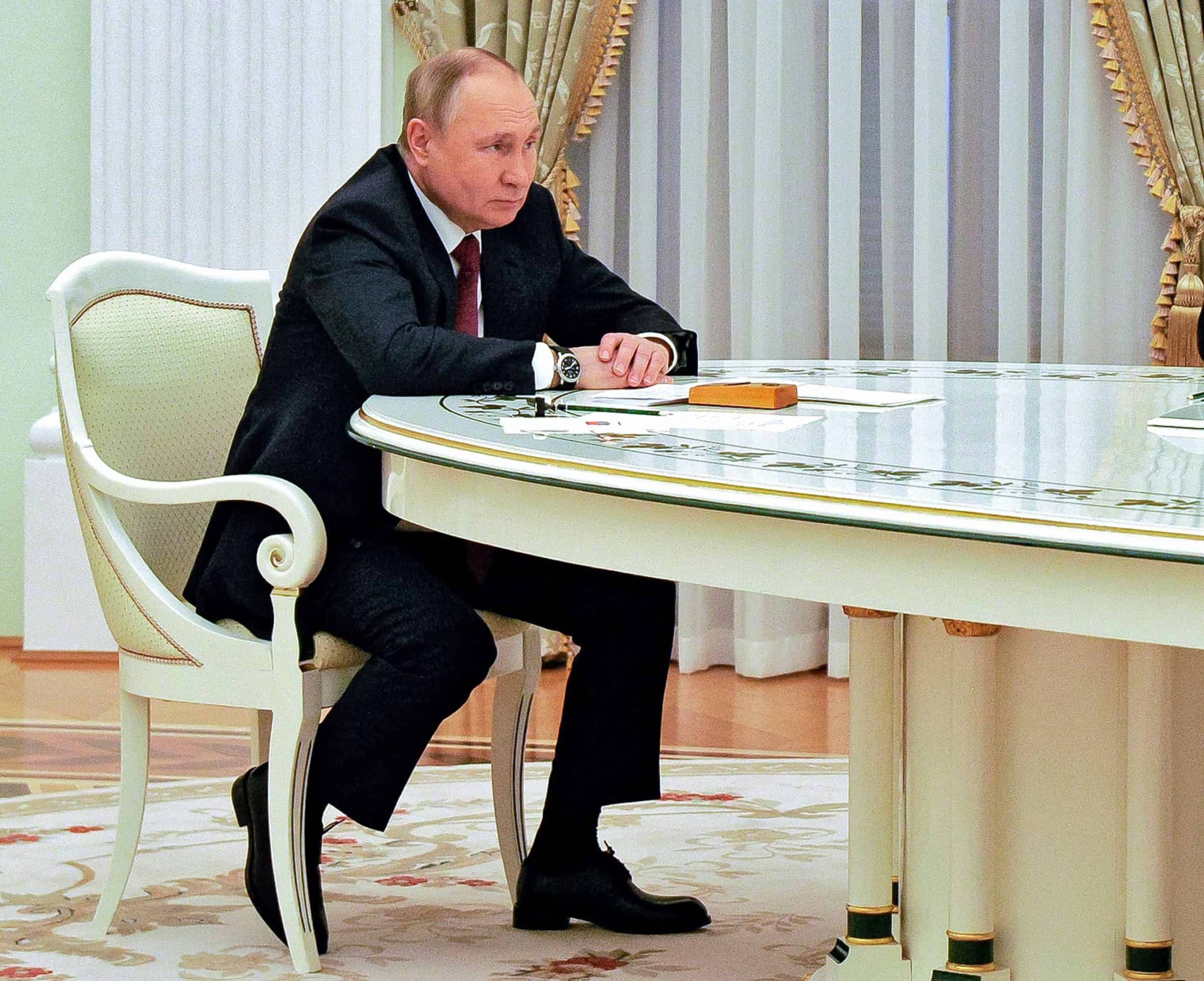 Macron & Putin's meeting on an huge table got the meme treatment